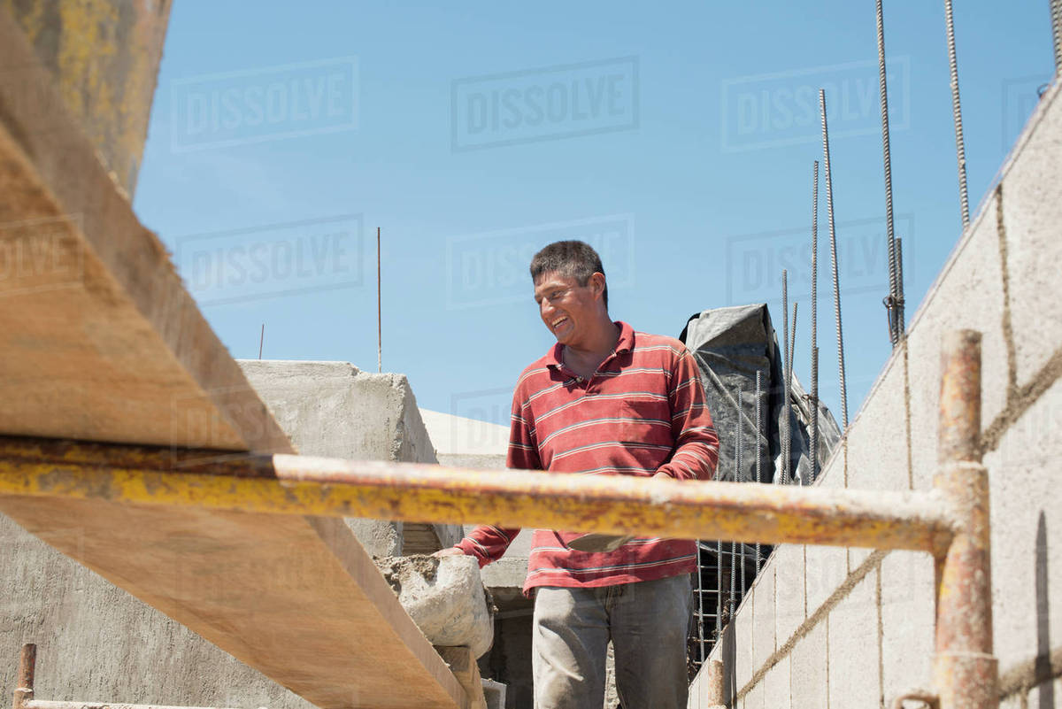 Hispanic construction worker at construction site - Royalty-free Stock ...