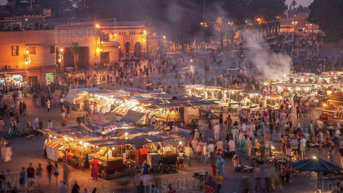 Crowd at night in Jamaa el Fna Square, Marrakesh, Morocco, - Royalty ...