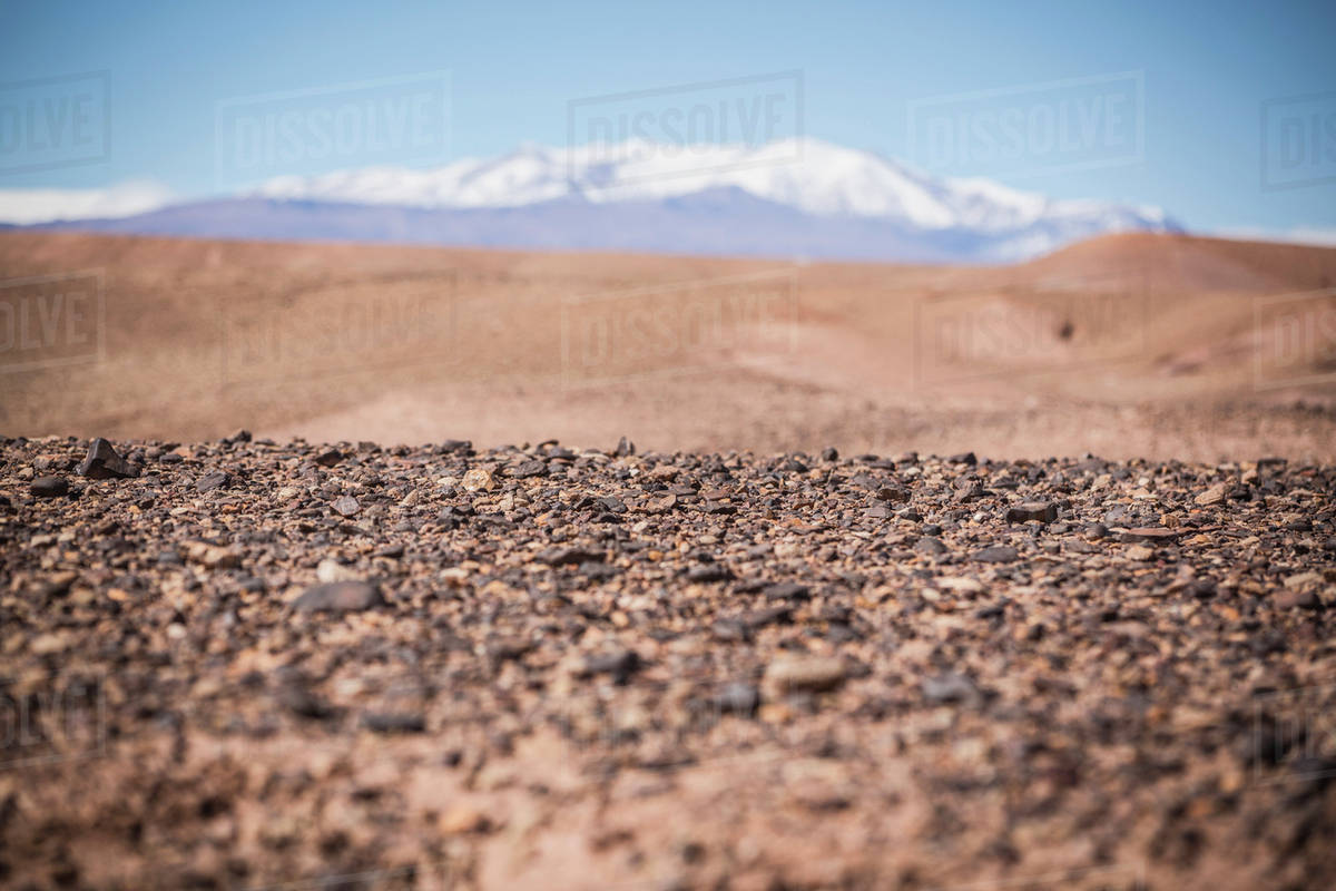 Surface level view of gravel field and remote desert - Royalty-free ...
