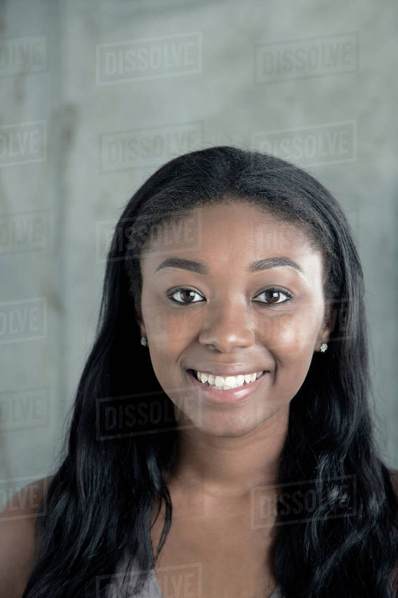 Portrait of smiling Black woman - Royalty-free Stock Photo | Dissolve