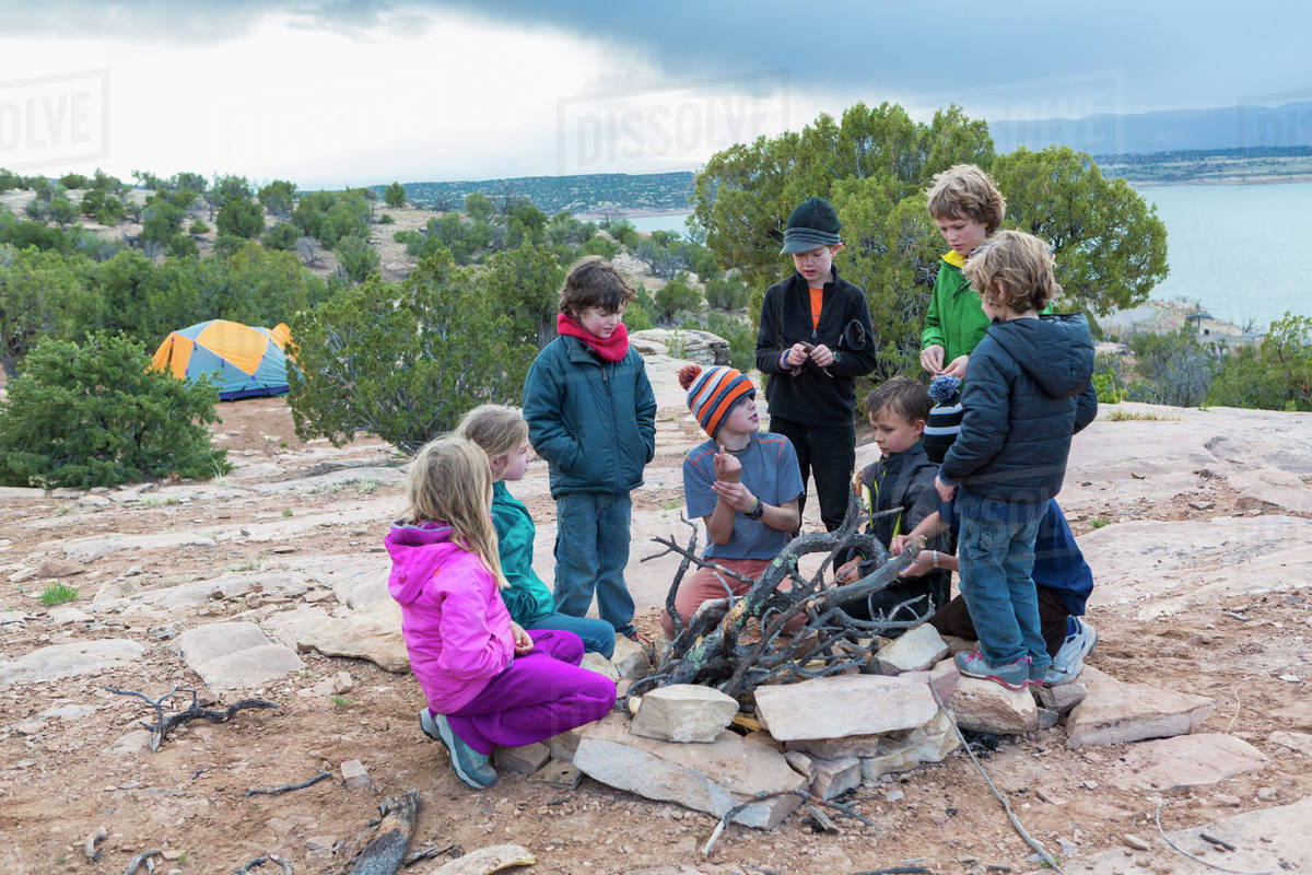 Children building campfire on field trip - Royalty-free Stock Photo ...