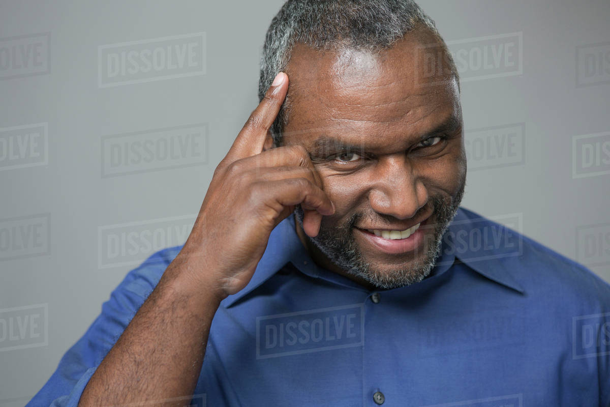 Older African American man tapping his forehead - Royalty-free Stock ...