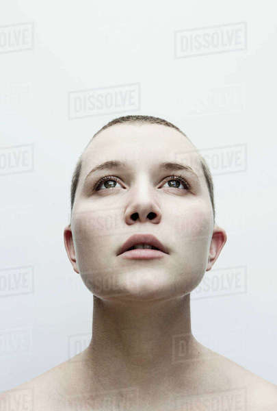 Portrait of woman looking up - Royalty-free Stock Photo | Dissolve