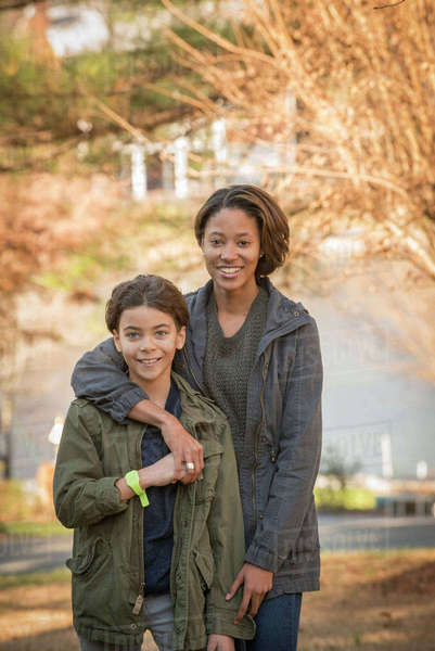 Portrait of smiling Mixed Race brother and sister outdoors - Stock ...