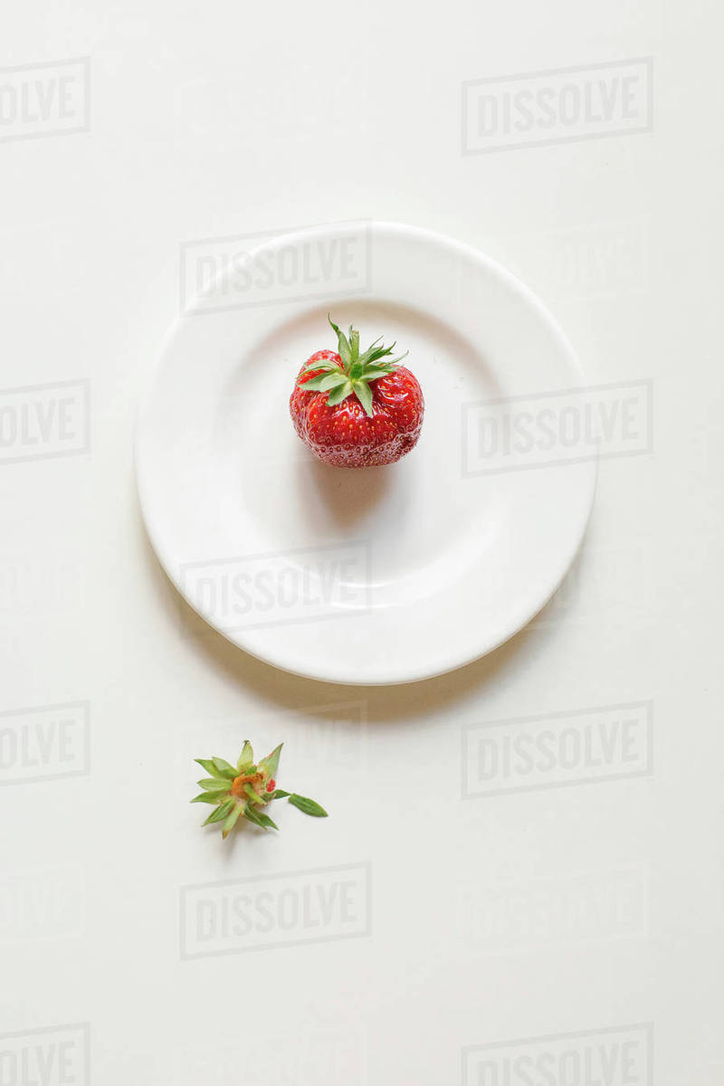 Strawberry on white plate - Royalty-free Stock Photo | Dissolve