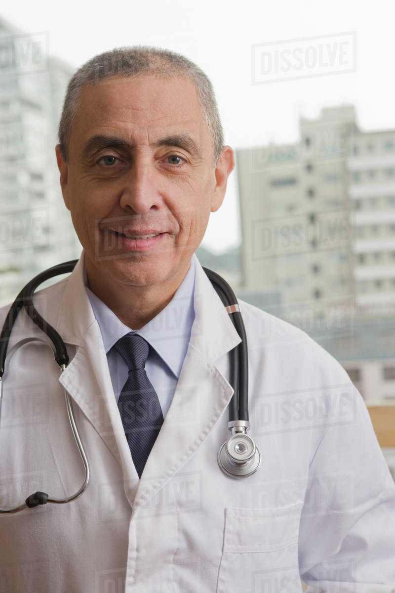 Close up portrait of Hispanic doctor - Royalty-free Stock Photo | Dissolve