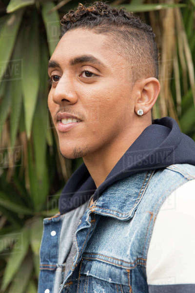 Portrait of pensive Mixed Race man - Royalty-free Stock Photo | Dissolve