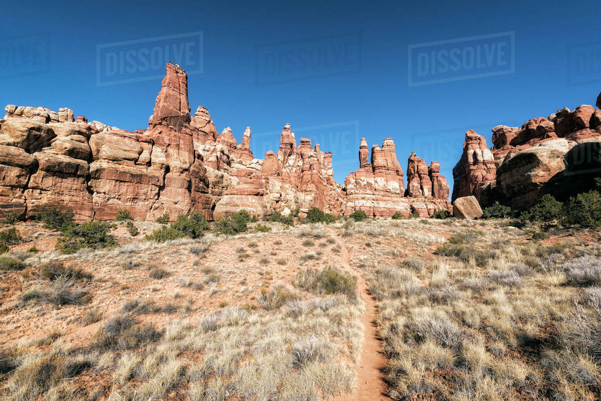 Blue sky over desert path, Moab, Utah, United States - Royalty-free ...