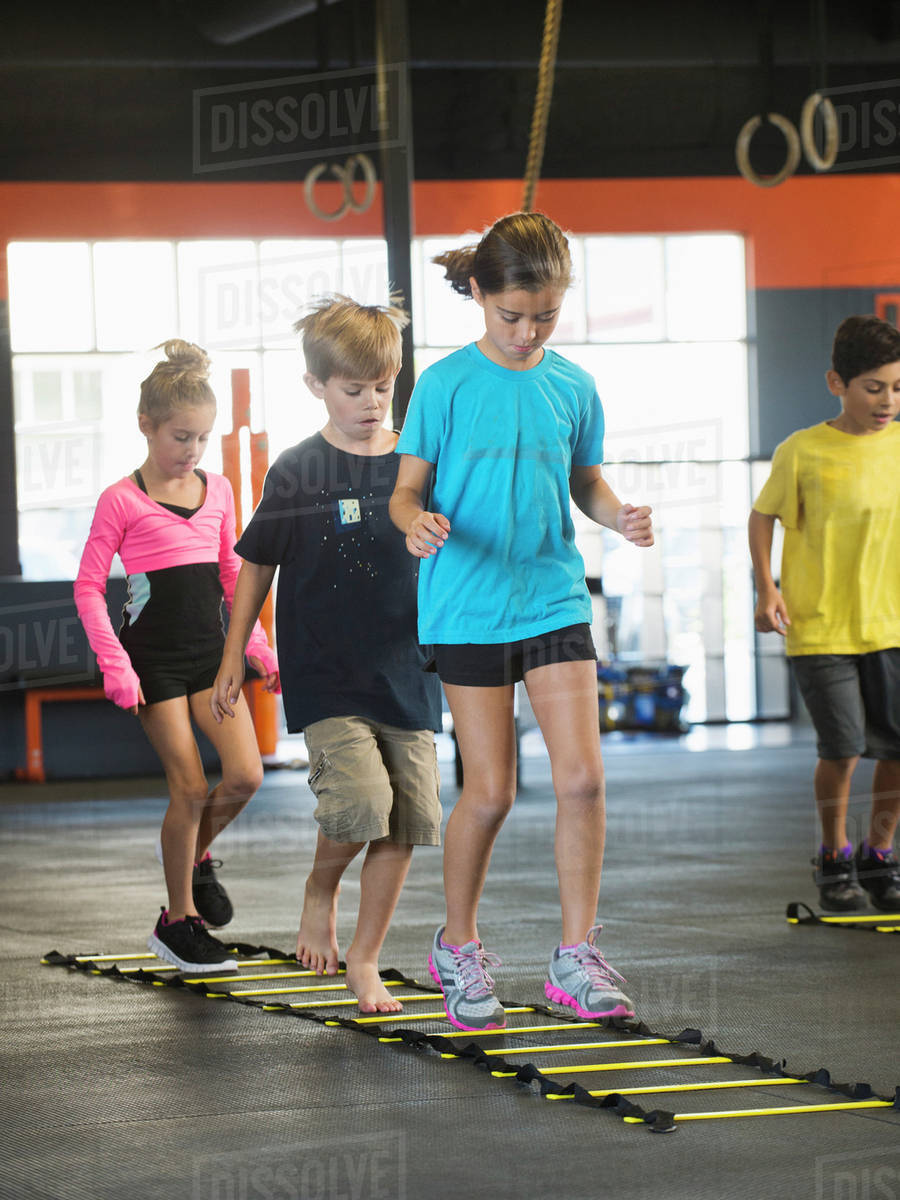 Children training in gym - Royalty-free Stock Photo | Dissolve