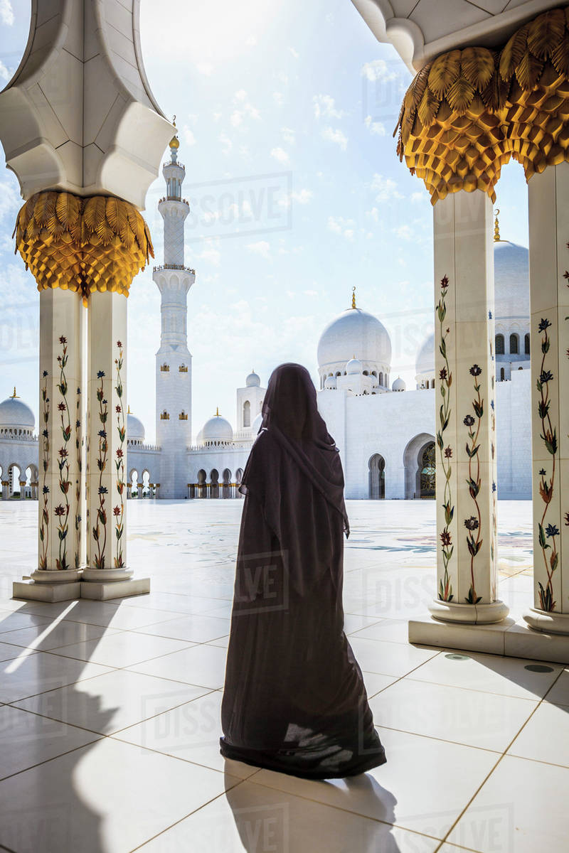 Woman walking at Sheikh Zayed Grand Mosque, Abu Dhabi, United Arab ...