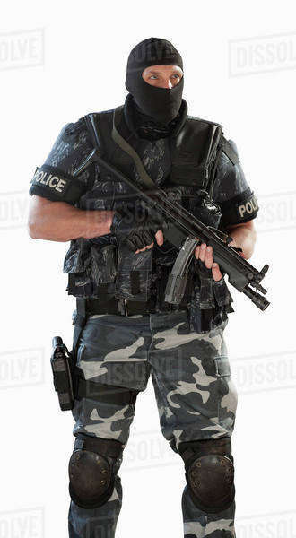 Police officer in gear holding assault rifle - Royalty-free Stock Photo ...