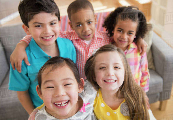 Children smiling together in living room - Royalty-free Stock Photo ...