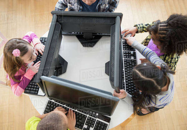 Children using computers in classroom - Royalty-free Stock Photo | Dissolve