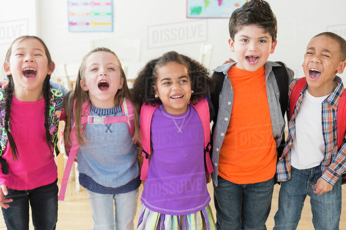 Students standing in line in classroom - Royalty-free Stock Photo ...