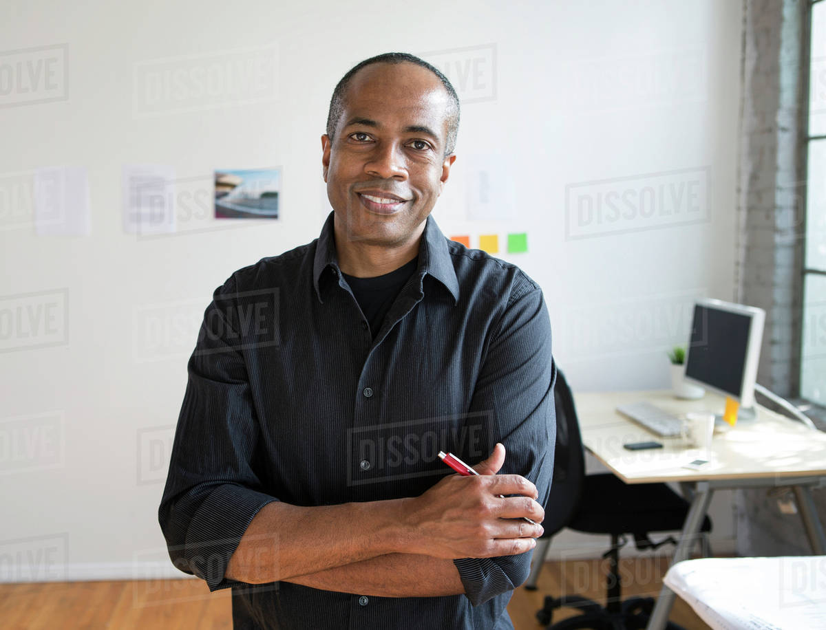 African American architect smiling in office - Royalty-free Stock Photo ...
