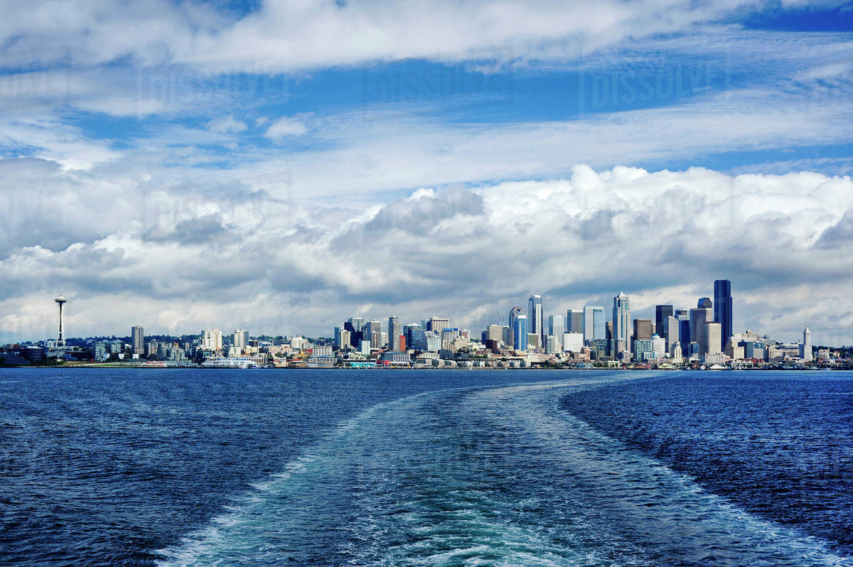 Seattle city skyline against cloudy sky, Seattle, Washington, United ...