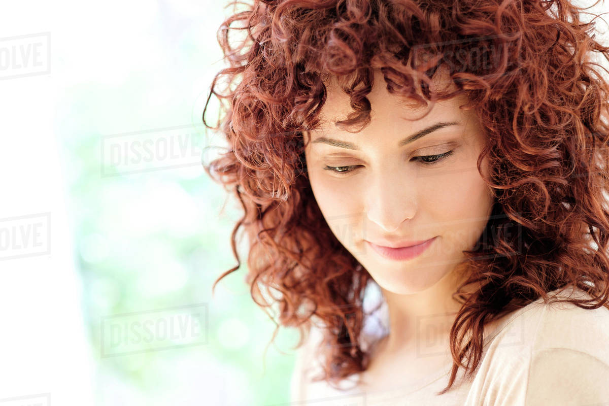 Close up of Hispanic woman's face - Royalty-free Stock Photo | Dissolve