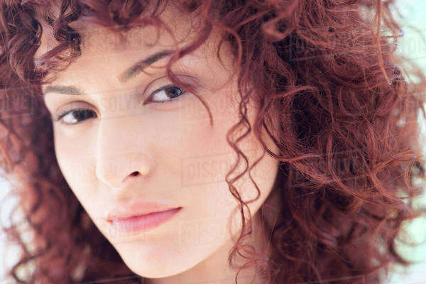 Close up of Hispanic woman's face - Stock Photo - Dissolve