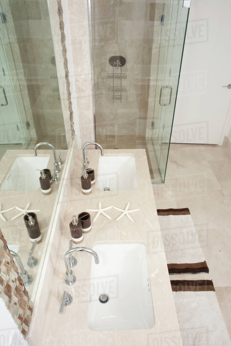 High angle view of sinks and shower in modern bathroom - Stock Photo ...