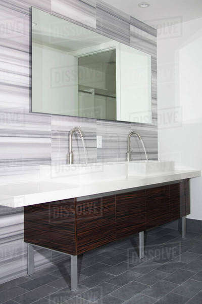 Sinks and mirror in modern bathroom - Royalty-free Stock Photo | Dissolve