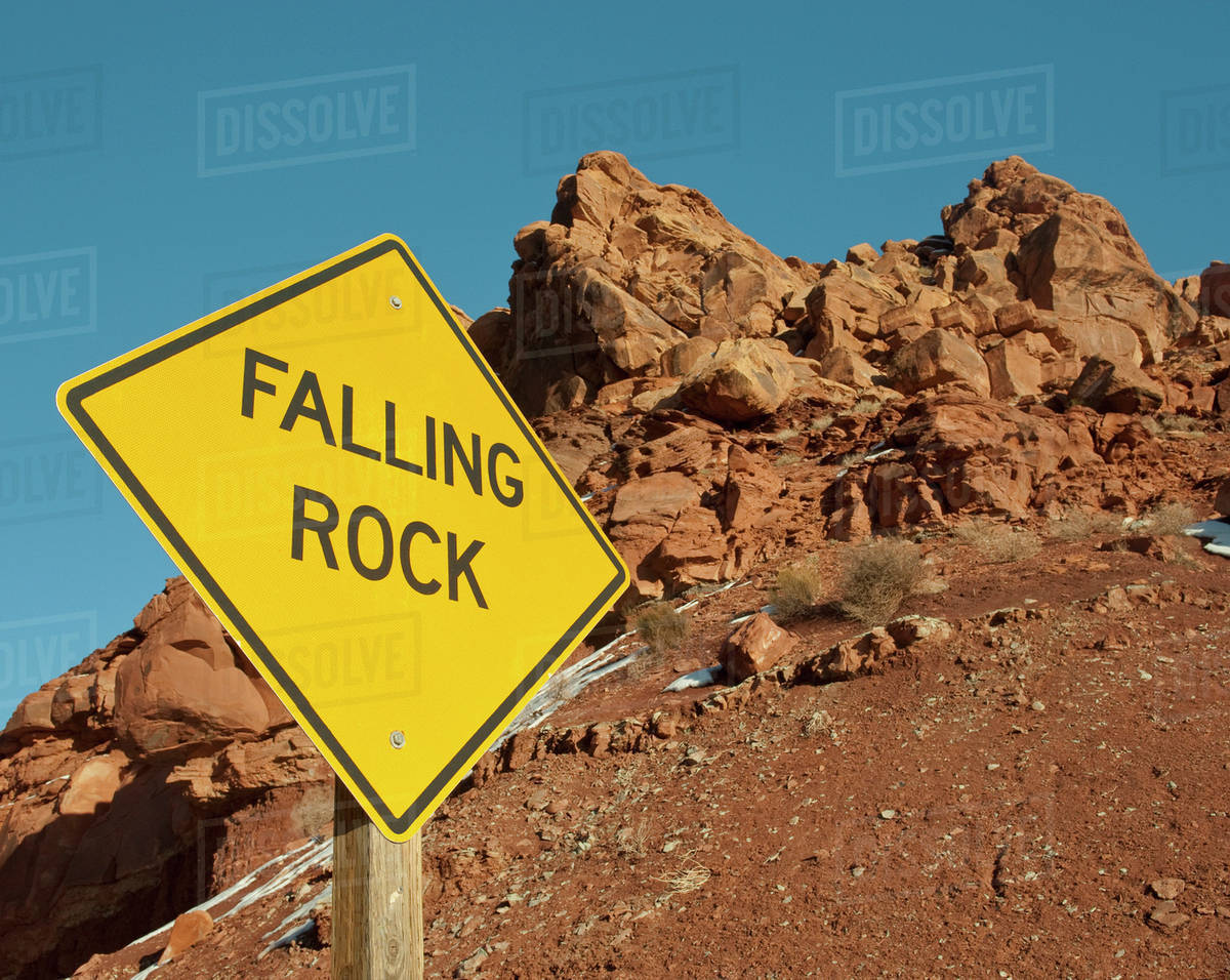 Falling Rock Sign in the Desert - Royalty-free Stock Photo | Dissolve