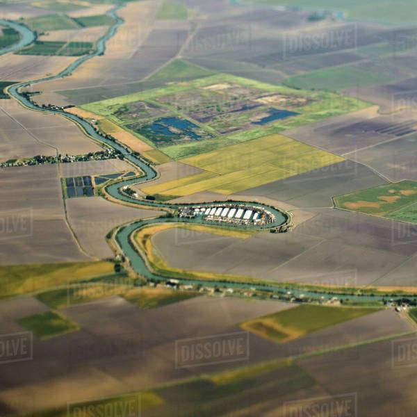 Aerial View of a River Passing Through Farmland - Royalty-free Stock ...