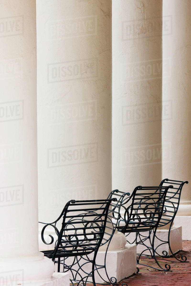 Wrought Iron Chairs and Columns - Royalty-free Stock Photo | Dissolve