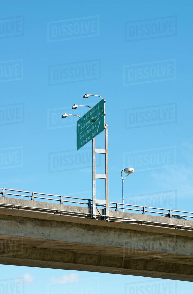 Road Sign on an Overpass - Royalty-free Stock Photo | Dissolve