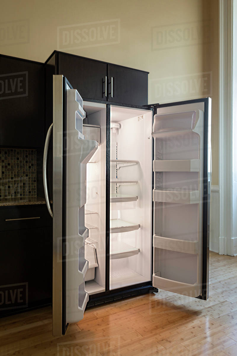 Open empty refrigerator in modern kitchen - Royalty-free Stock Photo ...