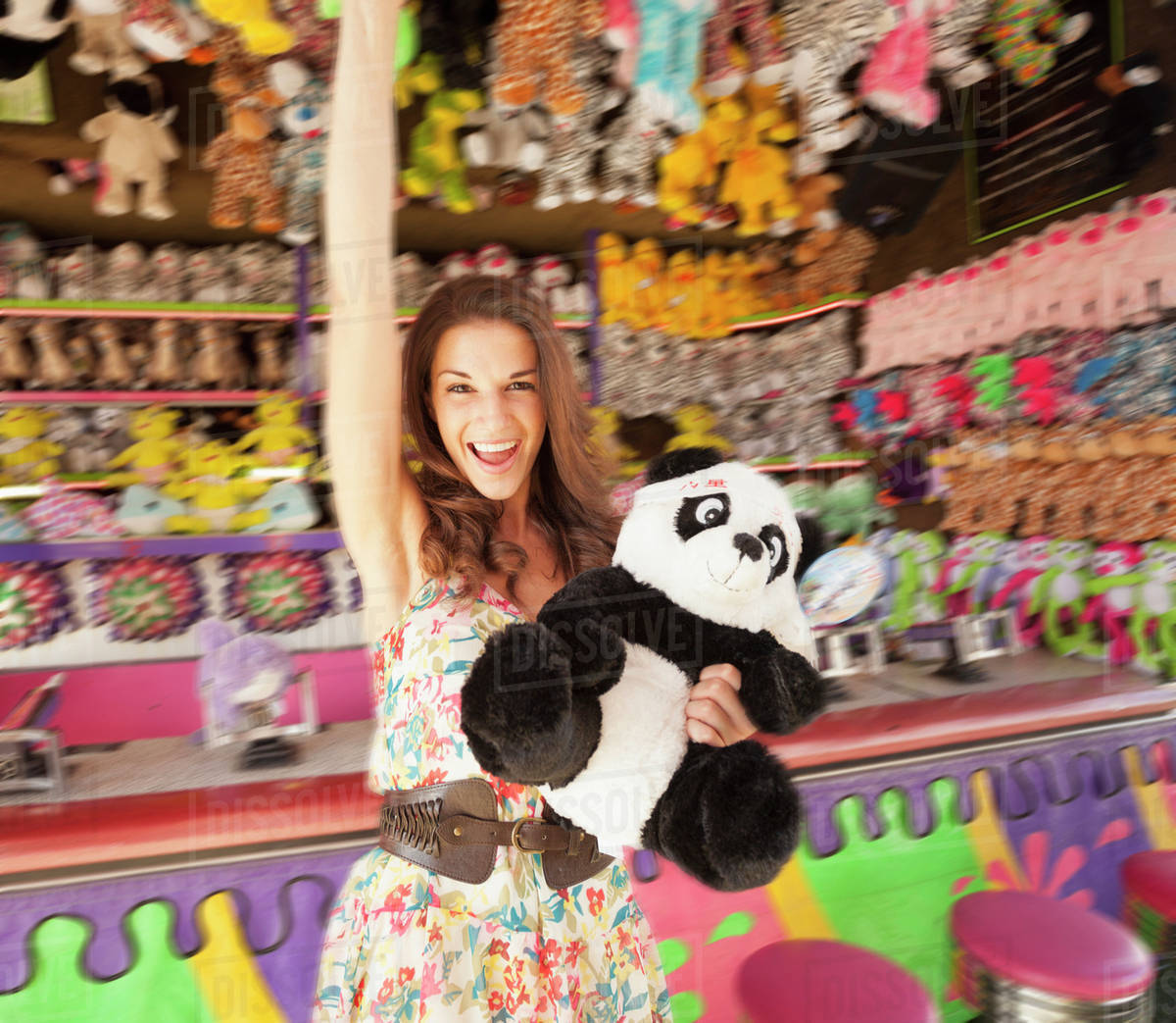 Caucasian woman holding stuffed animal at carnival - Royalty-free Stock ...