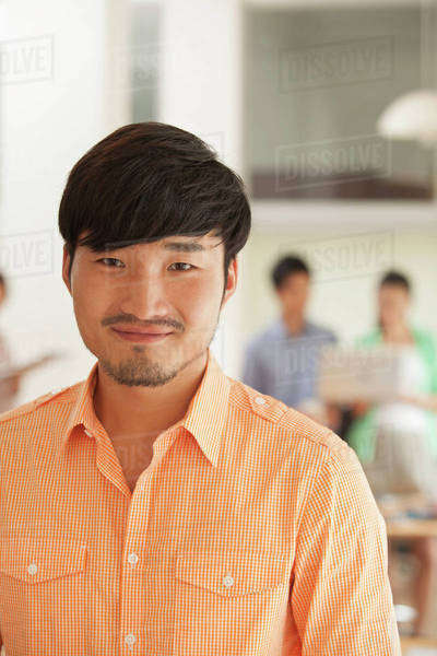 Smiling Chinese man - Stock Photo - Dissolve