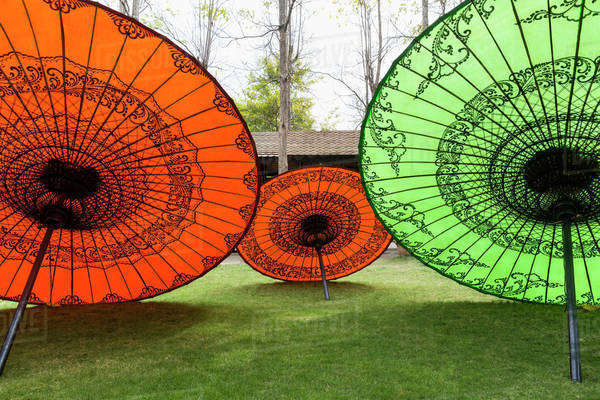 Traditional parasols in backyard - Royalty-free Stock Photo | Dissolve