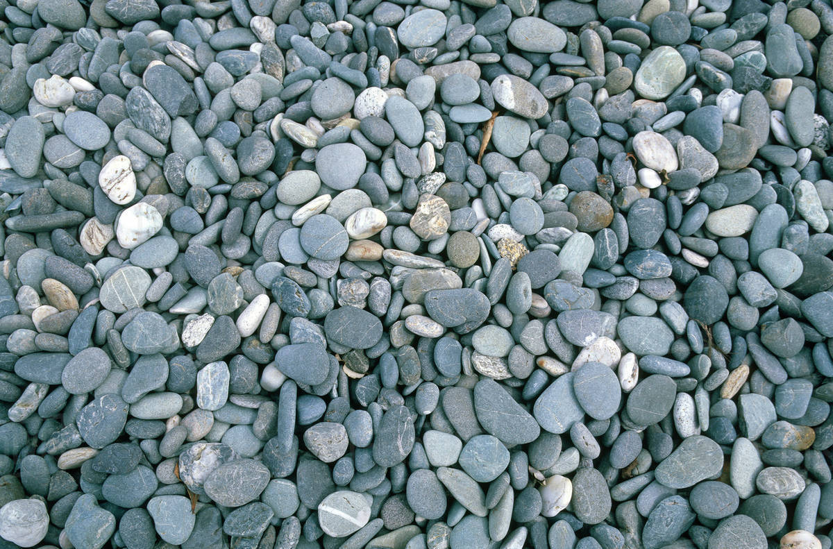 Close up of smooth pebbles - Royalty-free Stock Photo | Dissolve