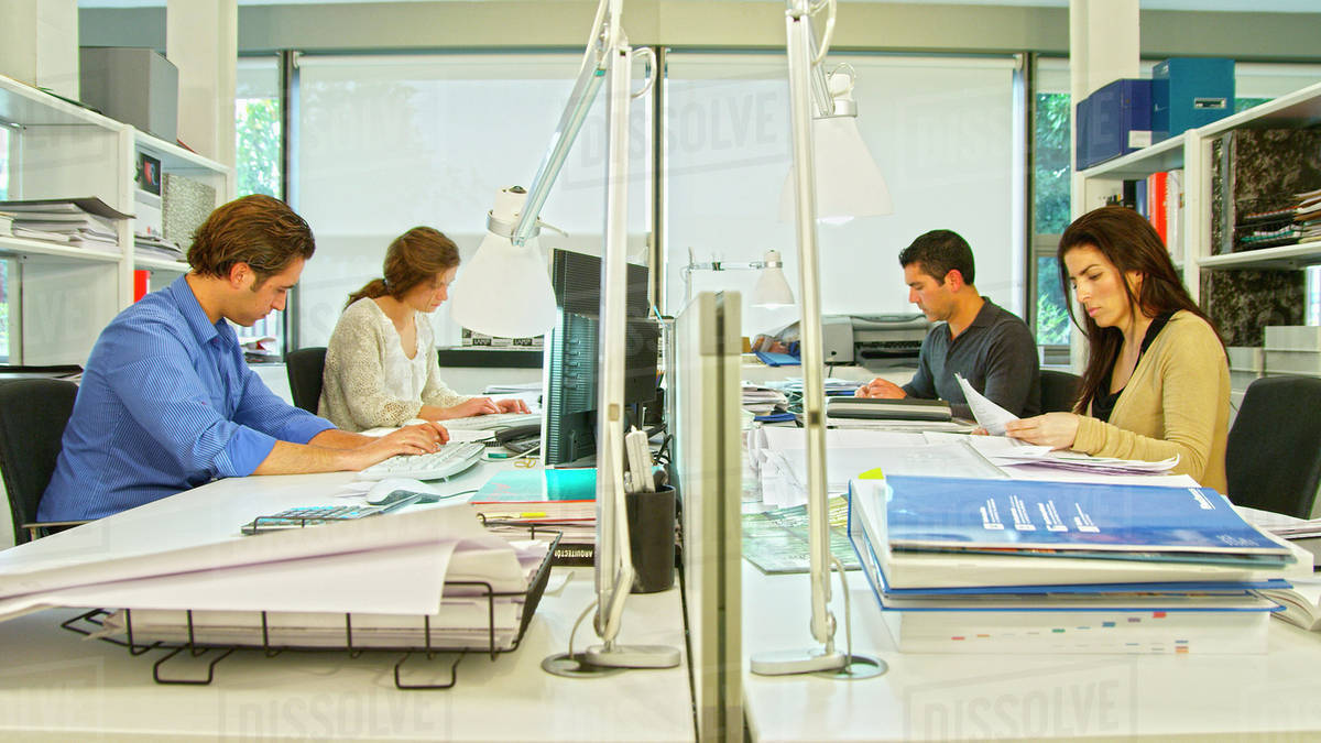 Business people working at desk in office - Royalty-free Stock Photo ...