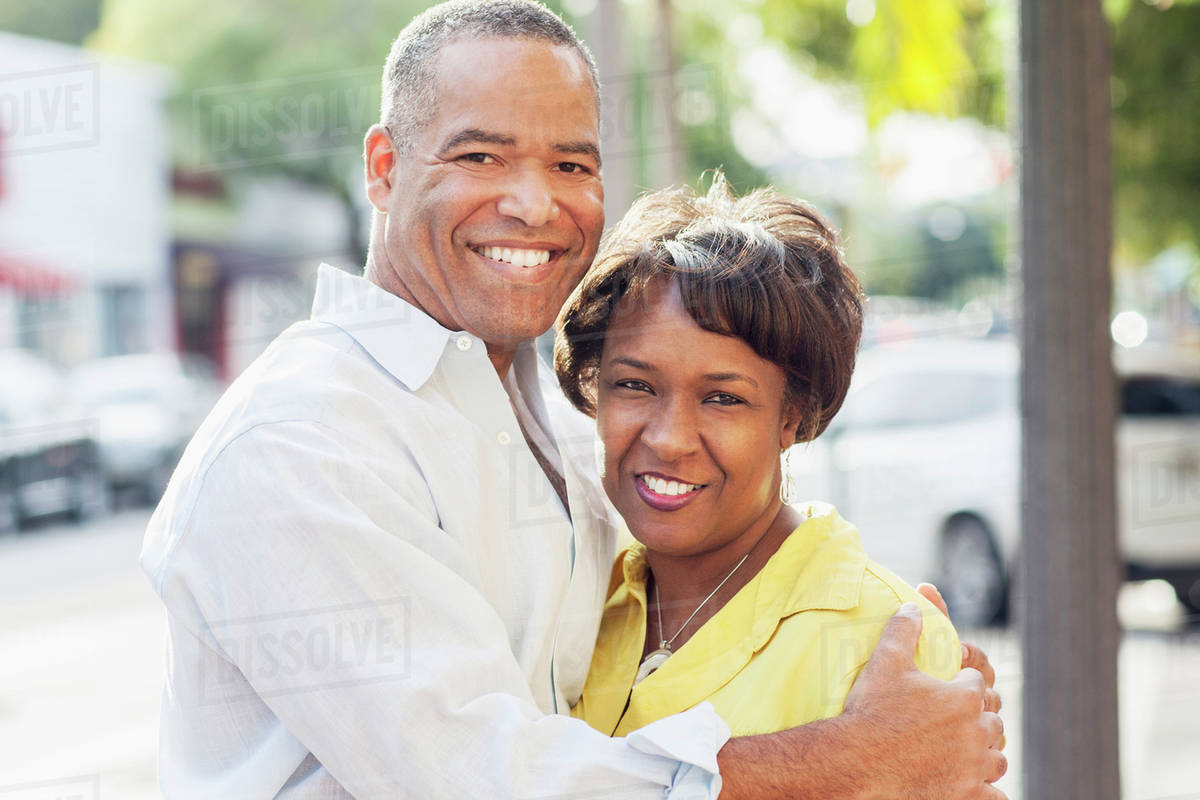African American couple hugging in city - Royalty-free Stock Photo ...