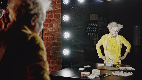 Angry mime looks at reflection in mirror in dressing room - 4K Royalty ...
