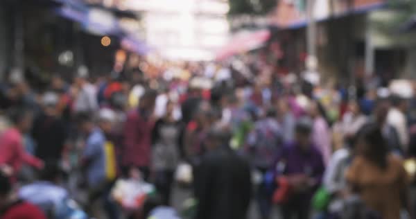 Slow motion of blurred busy busy fresh market full with crowd people ...
