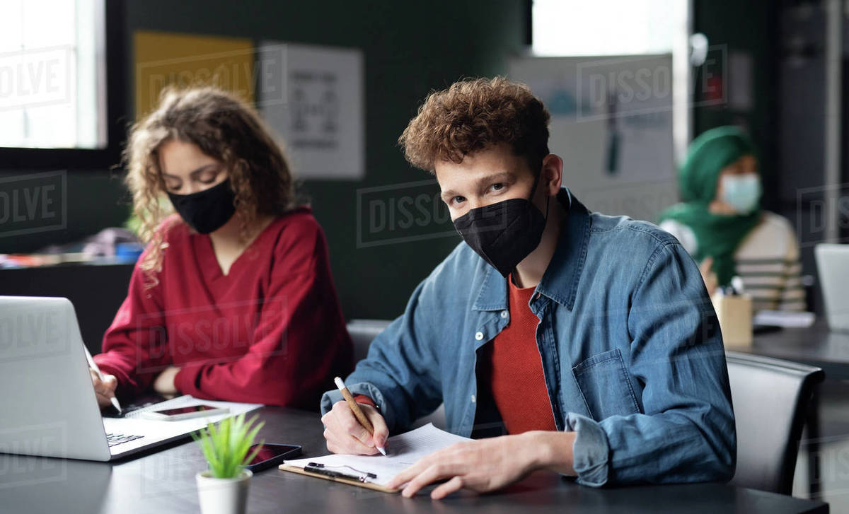 A group of people attending education class in community center ...