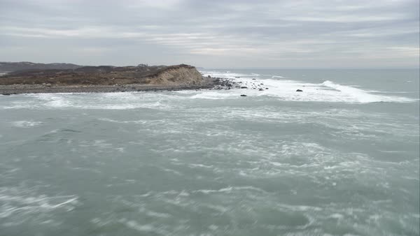 Over surf along the coast of Cuttyhunk Island, Massachusetts. Shot in ...