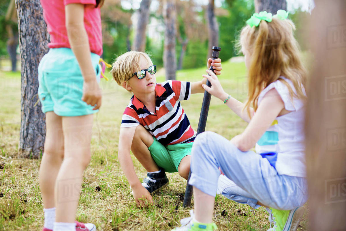 Group of friends playing together in the park - Royalty-free Stock ...