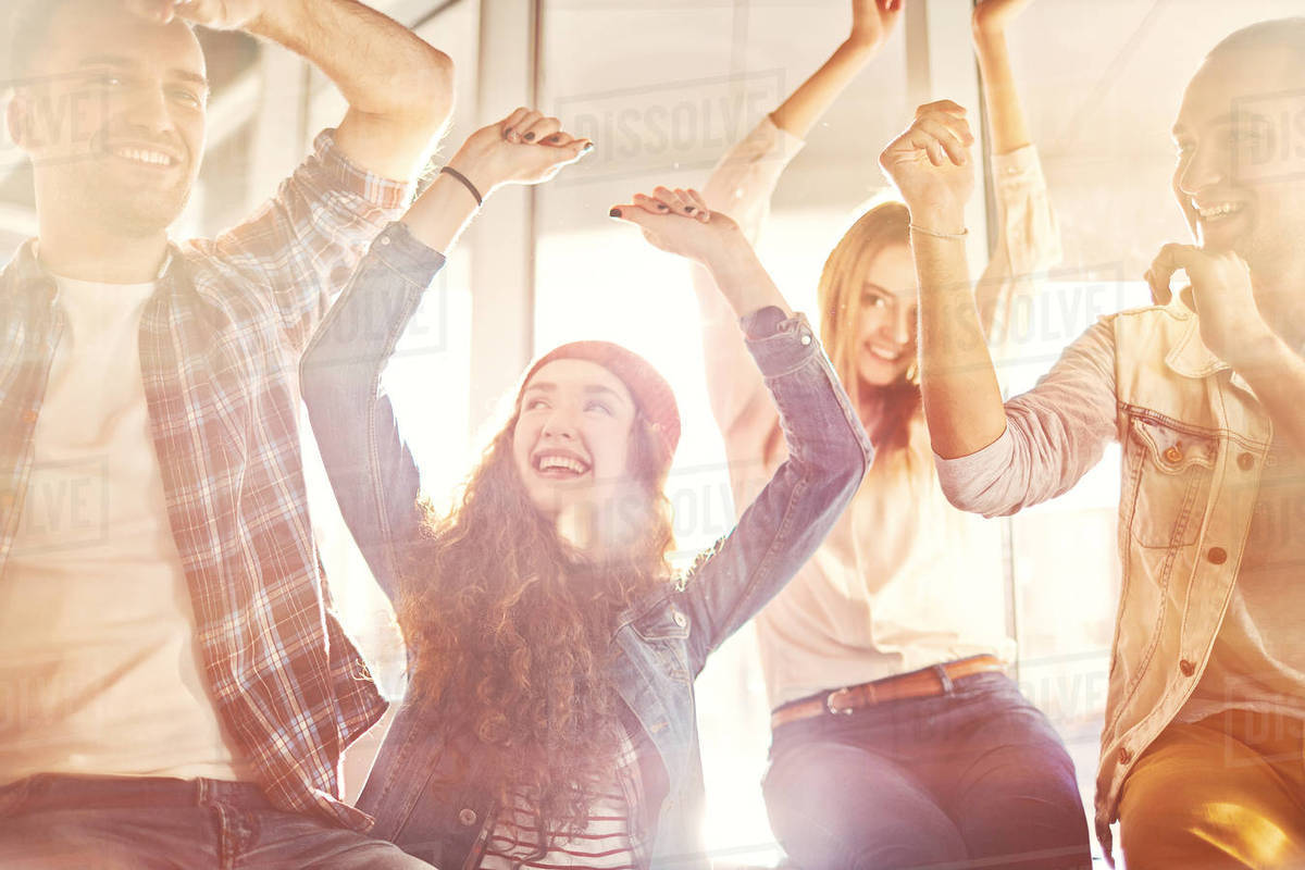 Young people having fun and laughing - Royalty-free Stock Photo | Dissolve