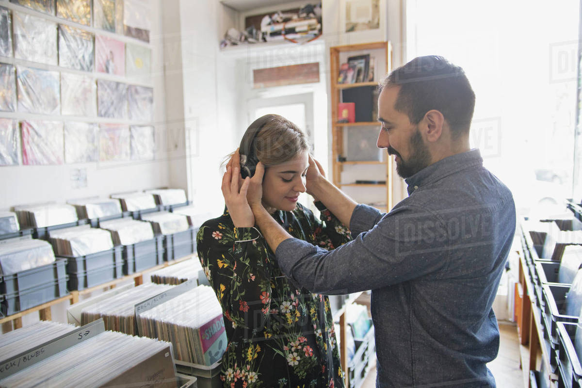Young couple at record store - Royalty-free Stock Photo | Dissolve