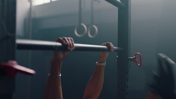 Fitness woman training pull ups exercise muscular female enjoying ...