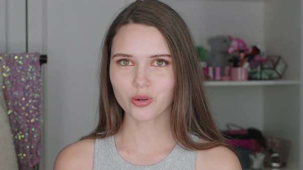 Beautiful teenage girl vlogger filming makeup tutorial sharing beauty ...