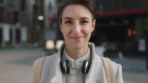 Portrait of beautiful young caucasian business woman intern smiling ...