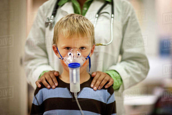 Portrait of young boy with oxygen mask. - Royalty-free Stock Photo ...