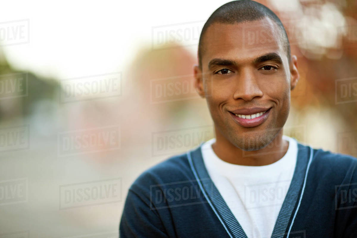 Portrait of smiling mid-adult man. - Royalty-free Stock Photo | Dissolve