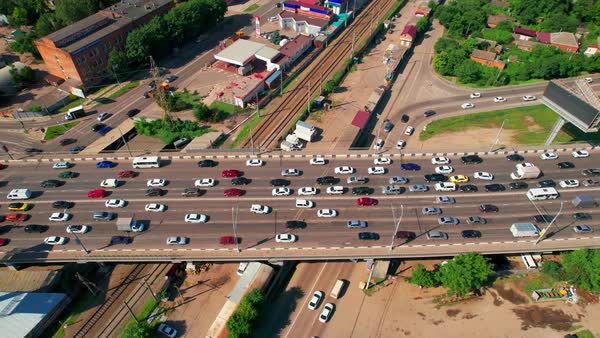 Transport Aerials - top down view of freeway busy city rush hour heavy ...