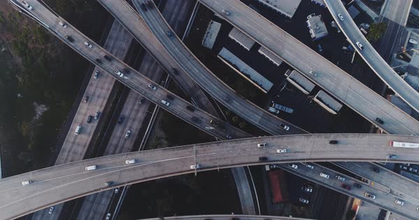 Aerial view looking straight down above busy freeway interchange with ...