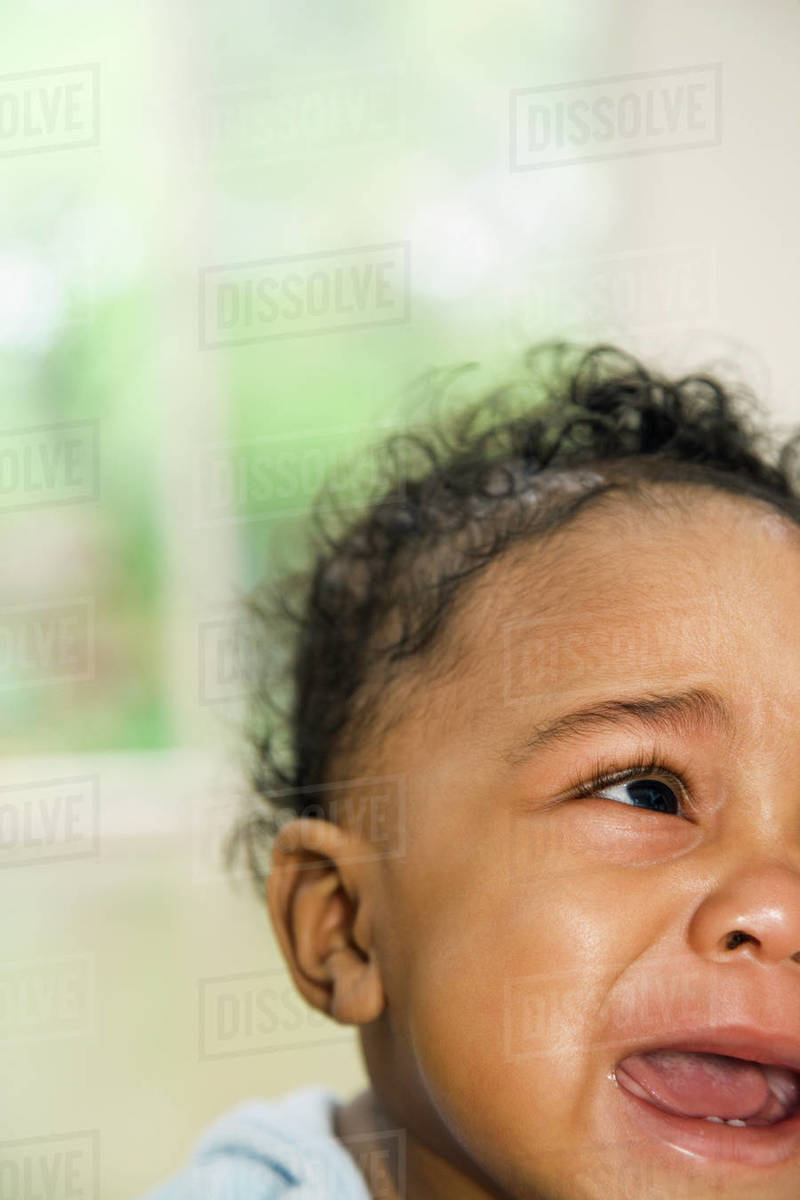 African American baby crying - Royalty-free Stock Photo | Dissolve